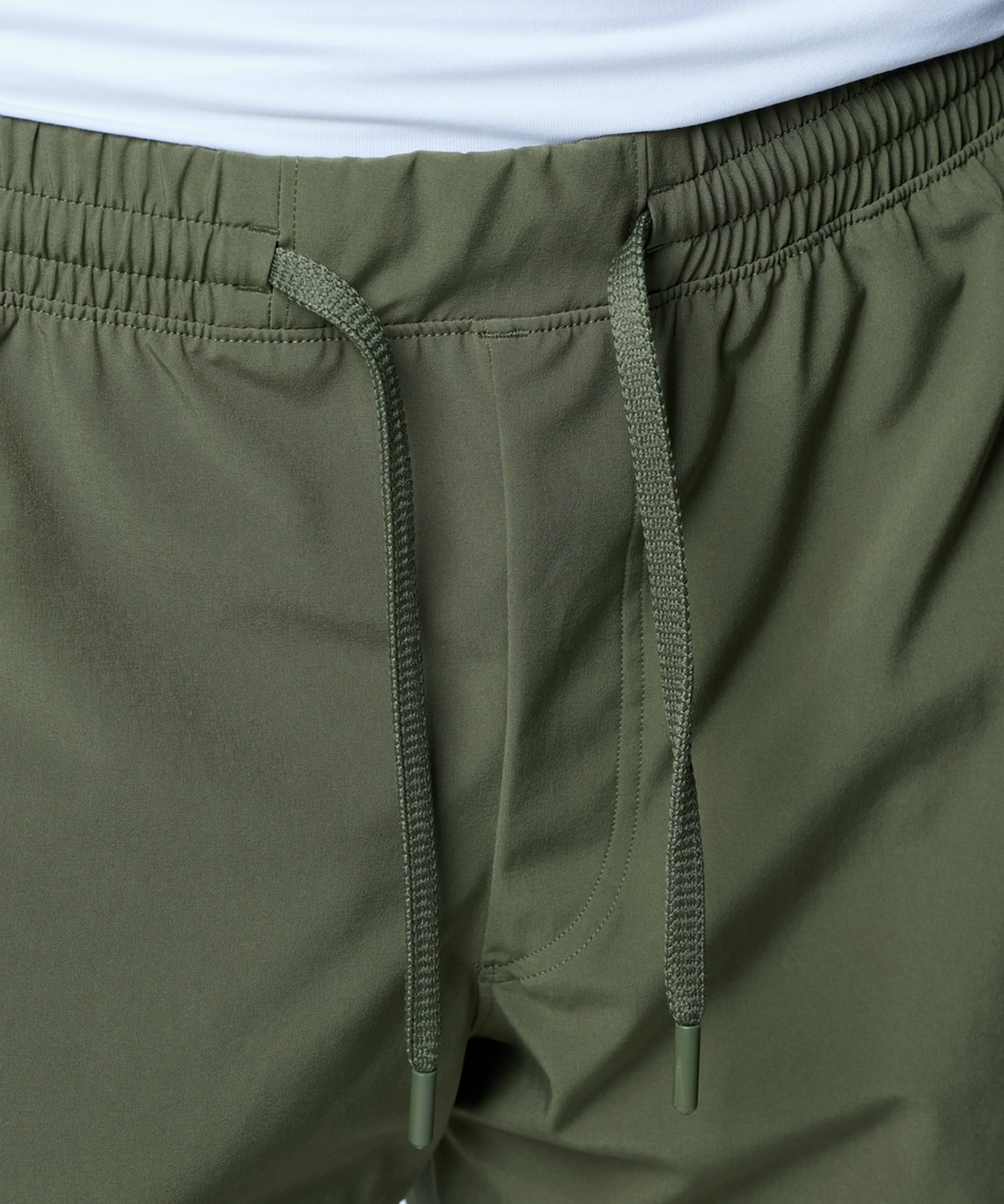 ロングパンツ UA Vibe Woven Pant 1386556-390 | スポーツ用品ならヒマラヤオンラインストア【公式】